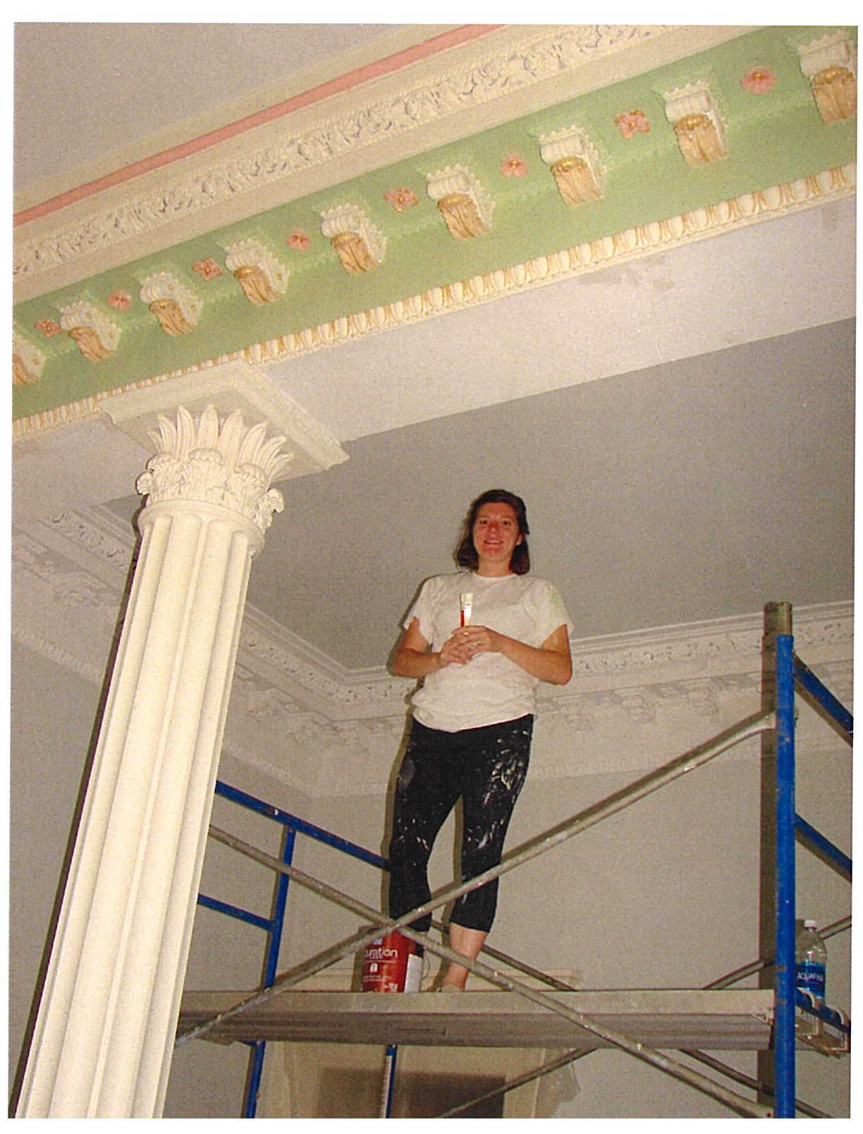 Grace high atop scaffoling continues work